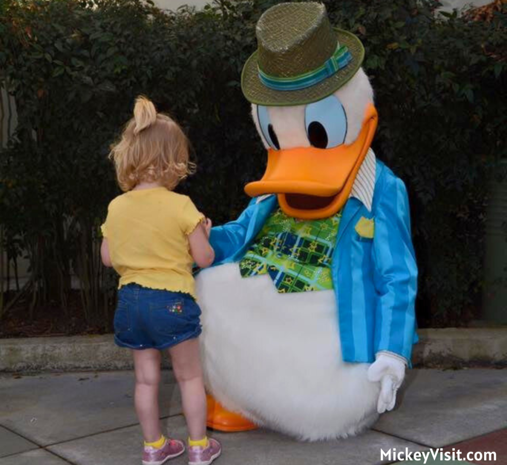 7 Tips For Going to Disney With a Shy Kid - Mickey Visit - Disney News ...